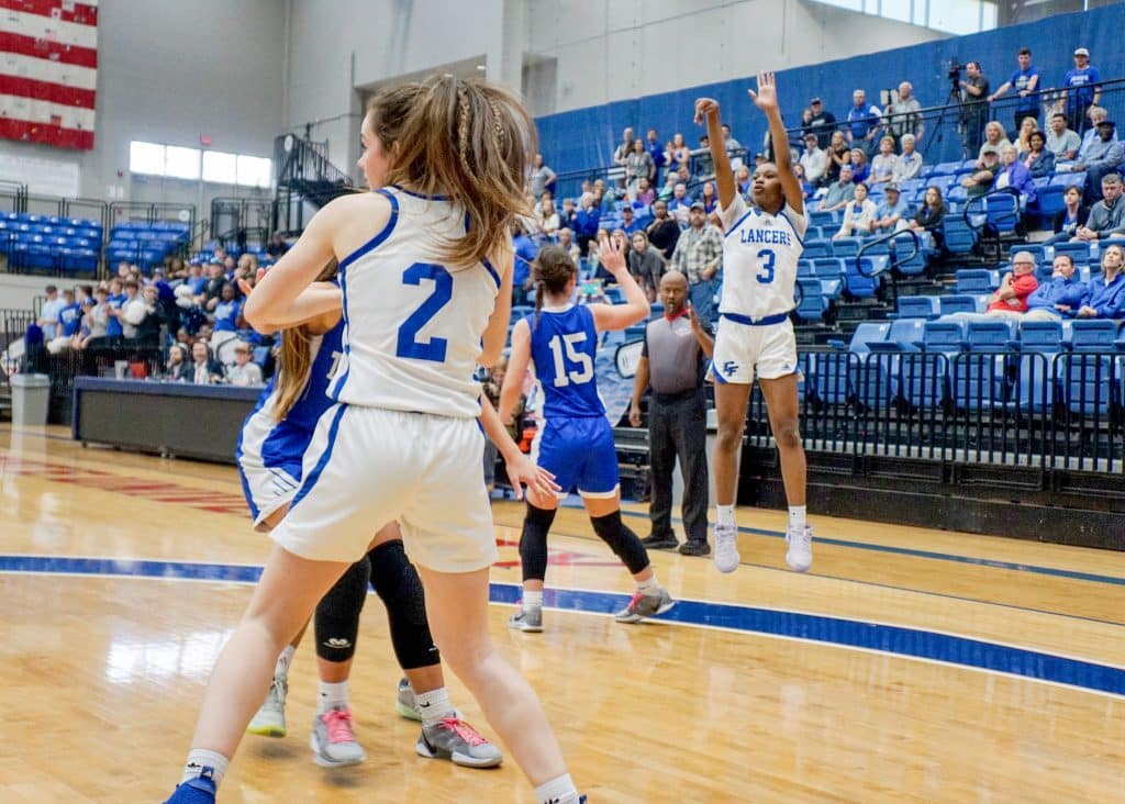 CFCA Lancers win third championship in six years with 56-49 win over ...